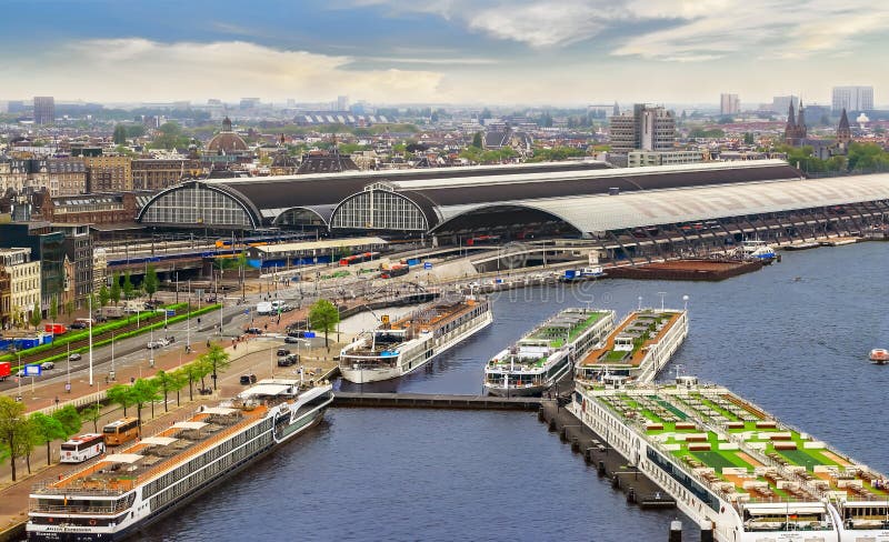 River Cruise Ships in Amsterdam in the Morning Editorial Stock Photo ...