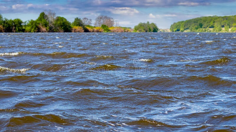 River with Dark Water and Waves in Windy Weather Stock Photo - Image of ...