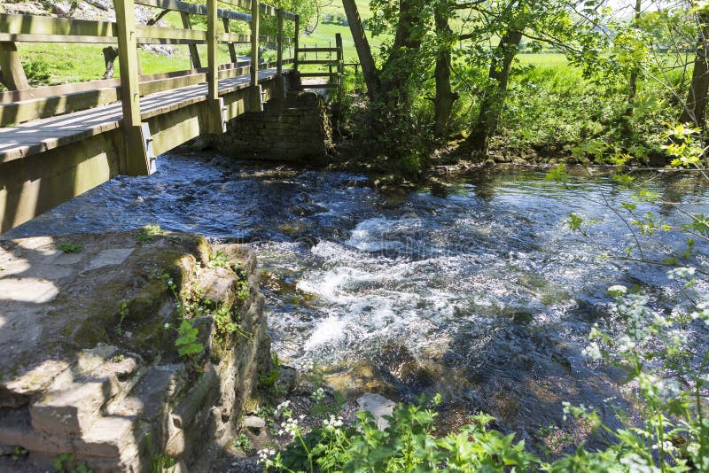Pretty River with Large Rocks on Its Banks in Italy Stock Photo - Image ...