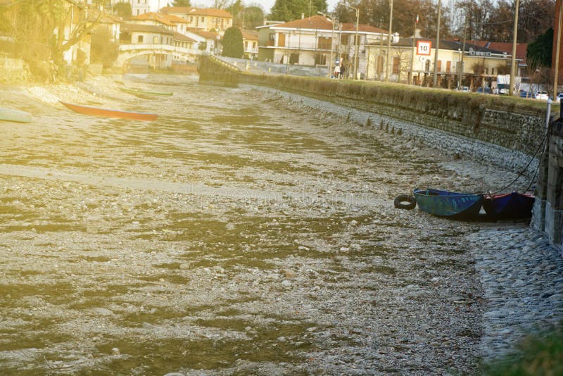 River Drought, Blue Boat without Water Due Global Warming Stock Photo ...