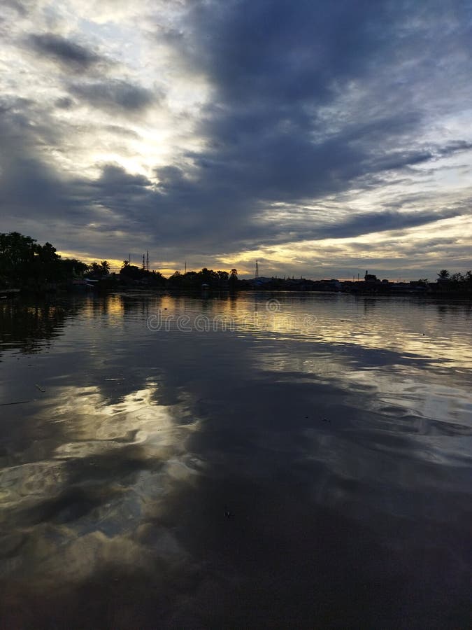 The river at dusk greets stock image. Image of morning - 243515579