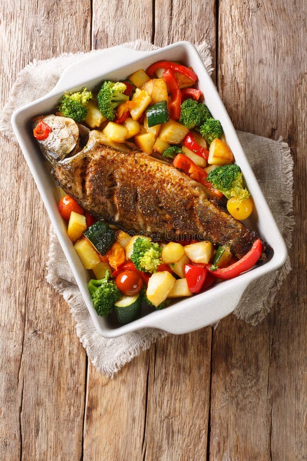 River Fish Baked Carp with Vegetables Close-up in a Baking Dish ...