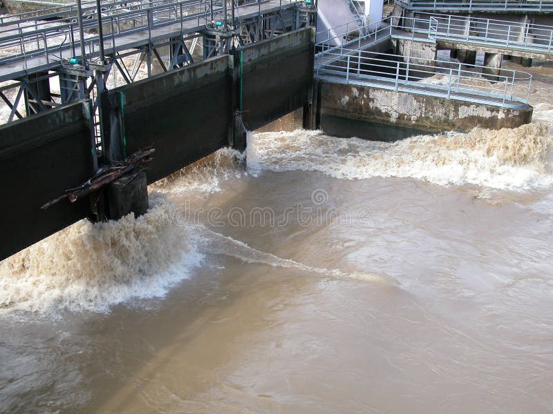River flood and dam wall stock image. Image of construction - 20235993