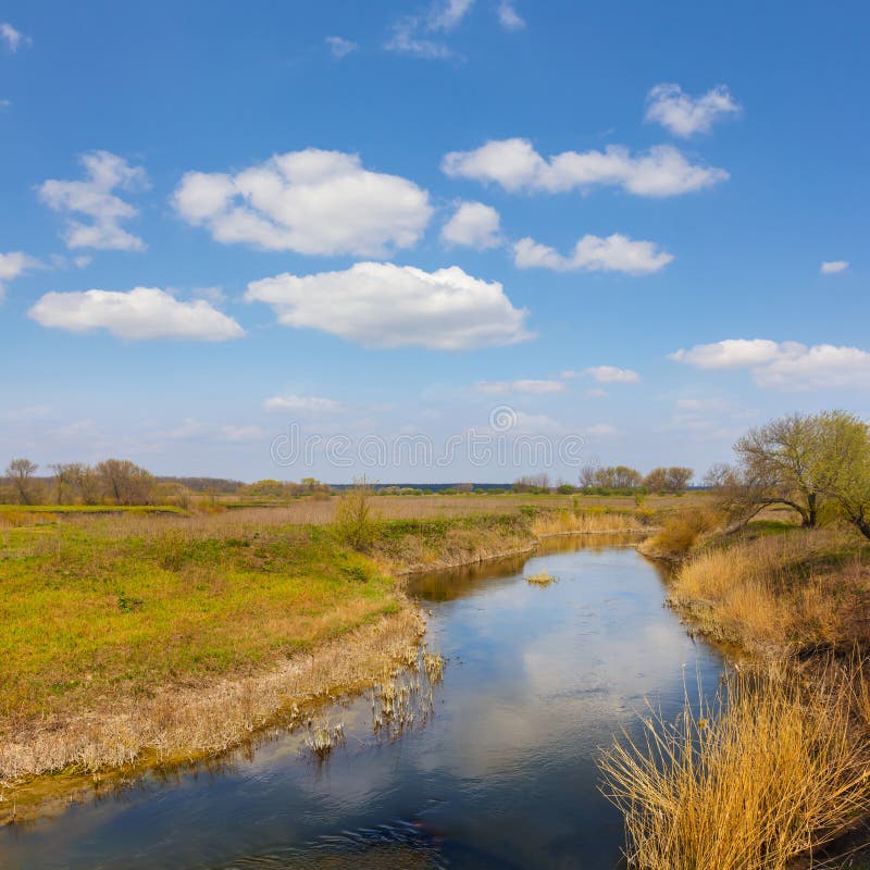 River Flow among Prairie Under Blue Cloudy Sky Stock Image - Image of ...