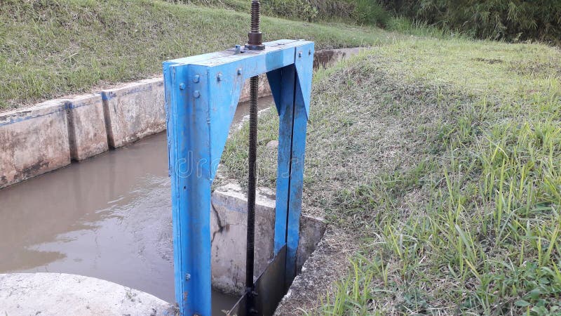 River flow regulator stock image. Image of lawn, backyard - 257428159