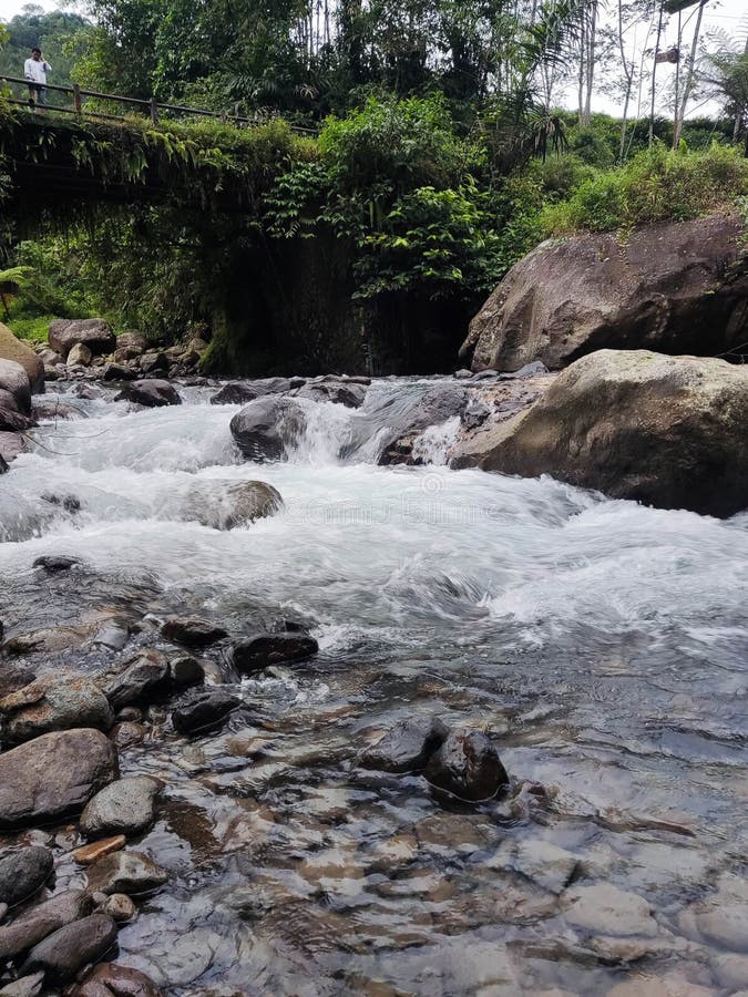 River Flow, Stone, and the Bridge Stock Image - Image of creek, bridge ...
