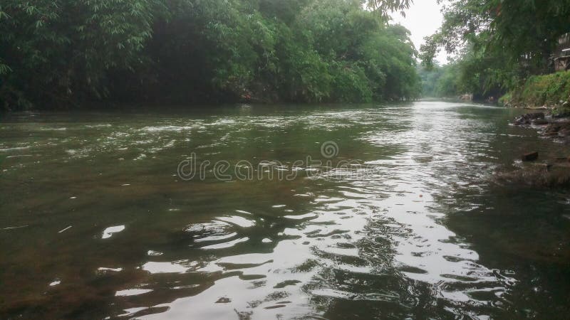 The River Flow in the Village Residential Area is Calming Stock Photo ...