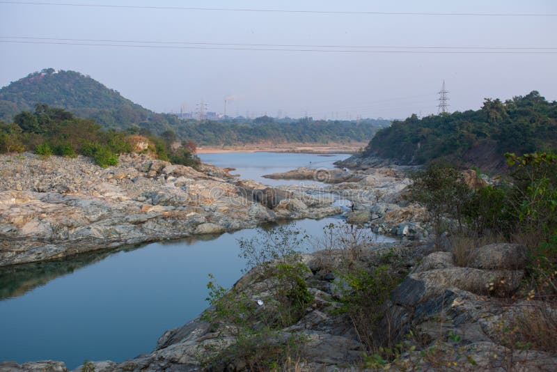 A River Flowing Down the Mountain with Rocks on Both Sides Stock Image ...