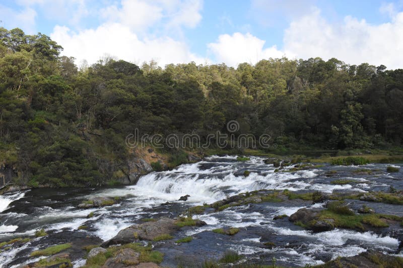 River Flowing with Green Hills and Blue Sky Stock Image - Image of ...