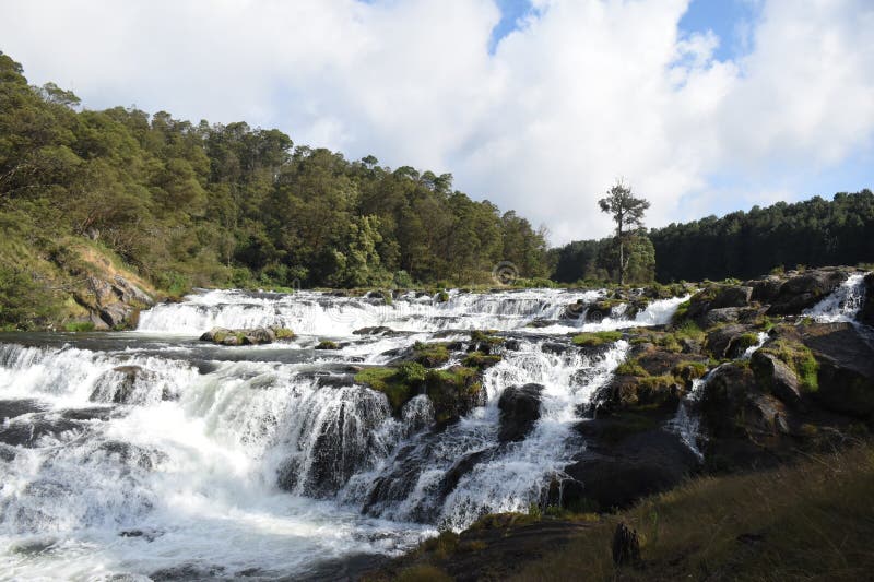 River Flowing with Green Hills and Blue Sky Stock Photo - Image of ...