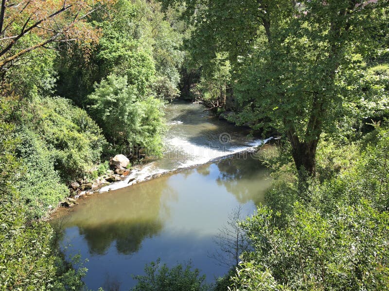Small Dam Diverting Water in a River Sousa Surrounded by Lush ...