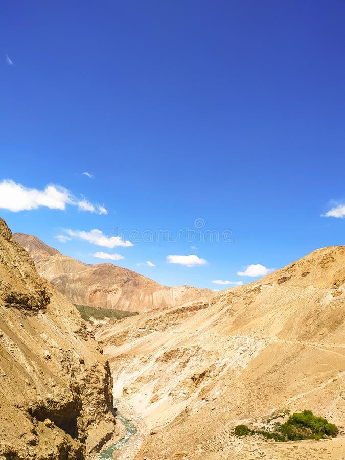 River Flowing in the Middle of the Valley with Blue Sky Stock Image ...