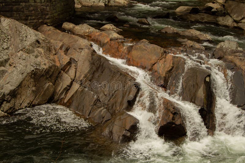 River Flowing Over Jagged Rocks Stock Photo - Image of flowing, rocks ...