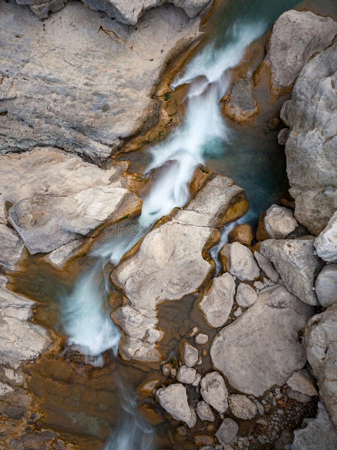 River Flowing between Rocks with Motion Blur Shot with Long Exposure ...
