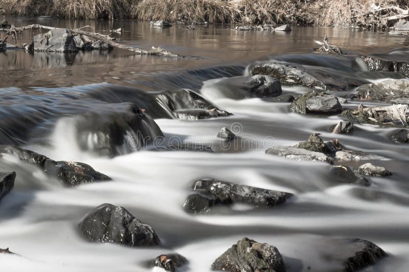 River Flowing through Rocks and Rapids in Denver, Colorado Stock Photo ...