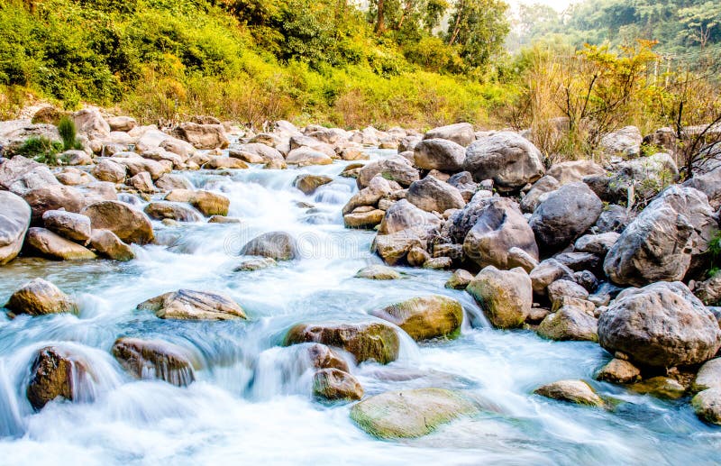 River Flowing through Rocks Stock Image - Image of environment, mrinal ...