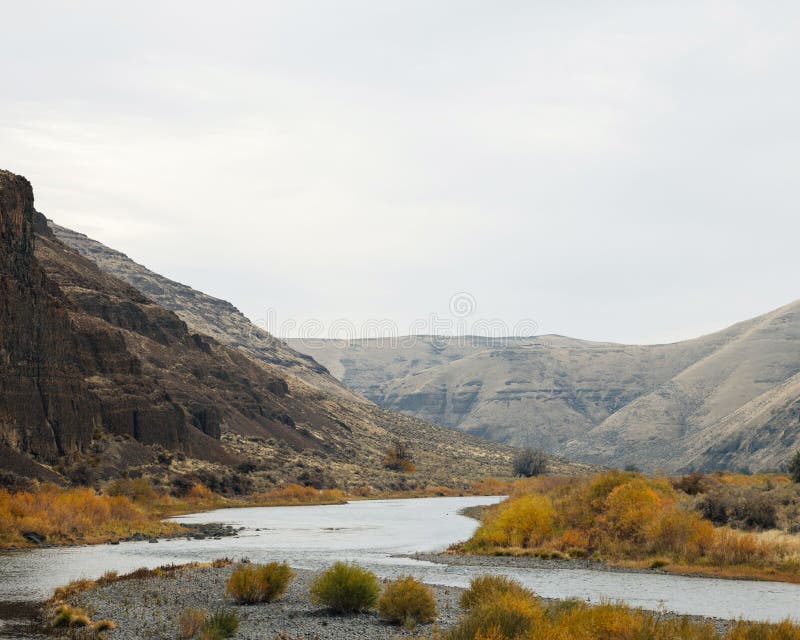 River Flowing through Rocky Hills Stock Photo - Image of beautiful ...