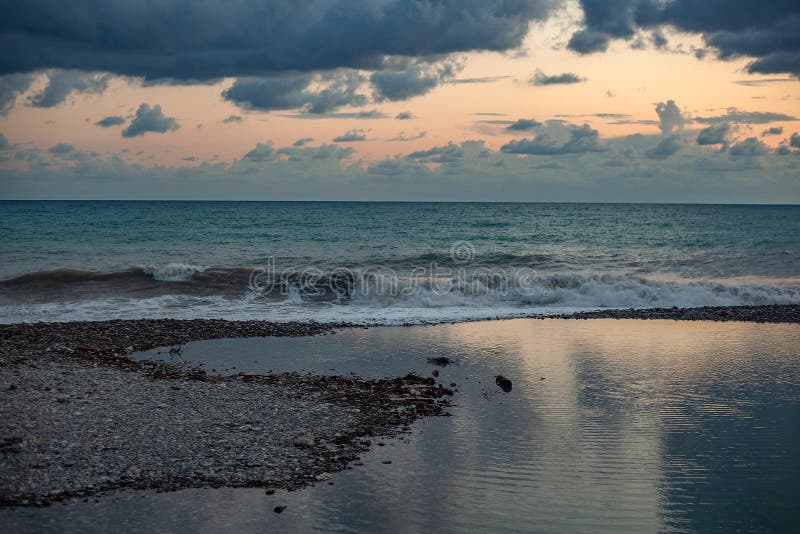 River flowing into the Sea stock image. Image of river - 229483005