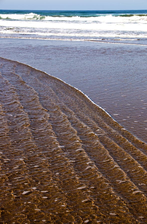 River Flowing into Sea on Wild Coastline Stock Image - Image of river ...