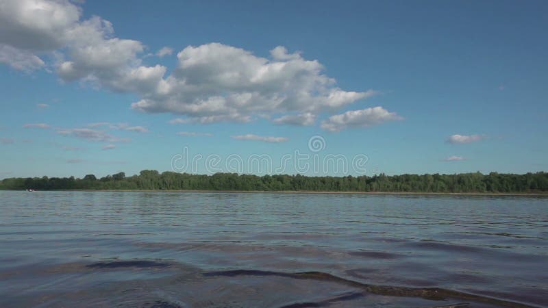 The River Flows Against the Background of the Forest and Clouds.HD ...
