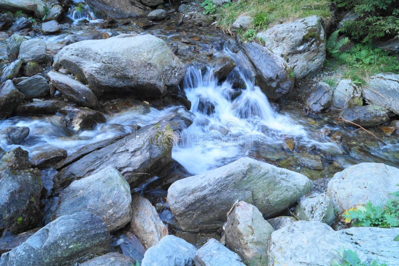 River that Flows through the Boulders Stock Photo - Image of mountain ...