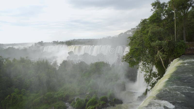 The River Flows at the Iguazu Falls. Stock Video - Video of flow, mist ...