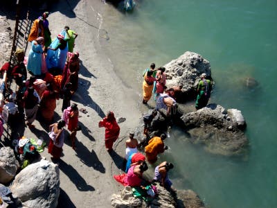 Religious Hindus Taking Holy Dip in River Ganga at Rishikesh, India ...