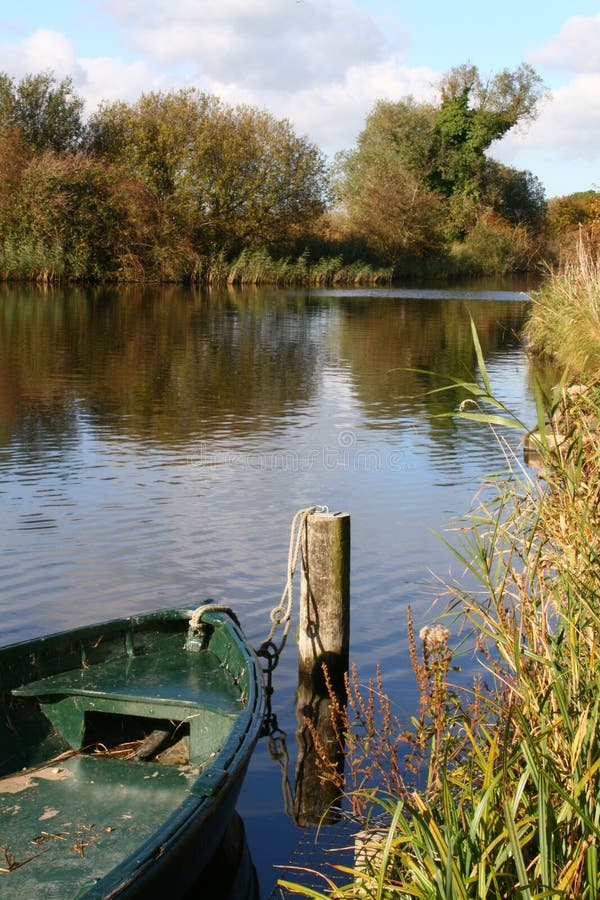 River with green boat stock image. Image of sail, post - 3744675
