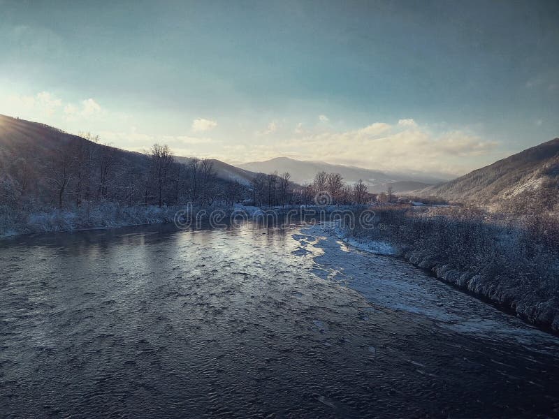 River with Ice on a Background of Mountains Stock Image - Image of ...