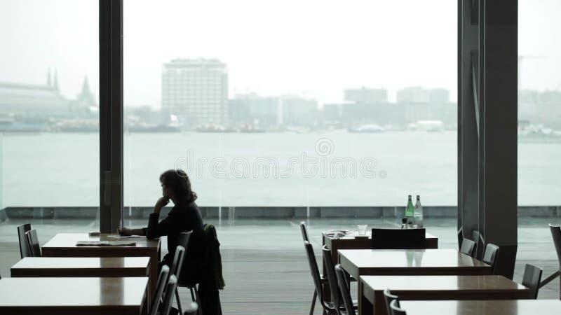 The River IJ Waterfront Cafe Interior with Amsterdam Skyline in the ...