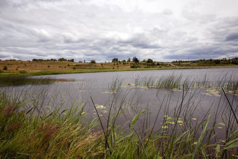 River and Lake in Cloudy Weather in Summer Stock Image - Image of dull ...