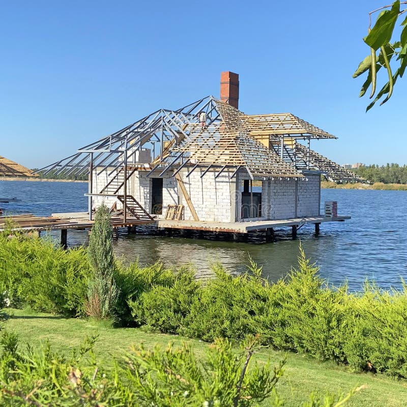 River or Lake House Building, Home on the Water Construction Stock ...