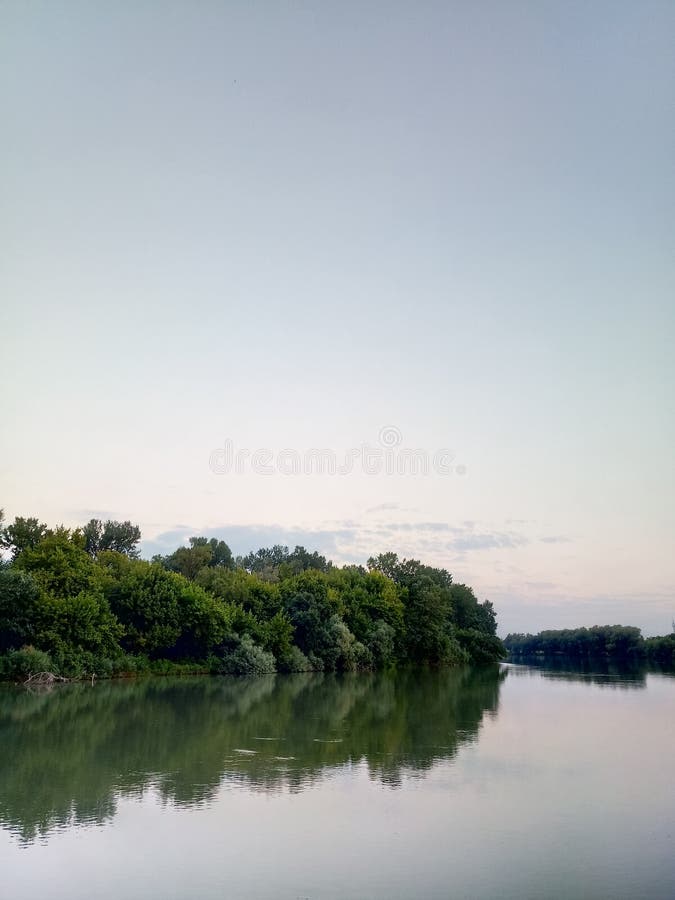River Landscape. River Flow. Water Surface and Trees on Shore Stock ...