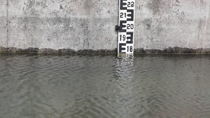 River Level Marker Near a Sluice on a Concrete Man Made River. Stock ...