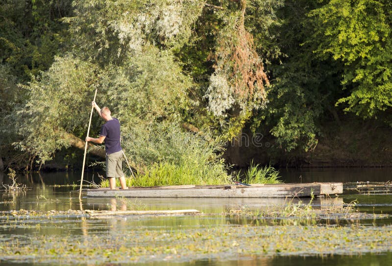 On the river stock image. Image of standing, boat, tree - 160588101