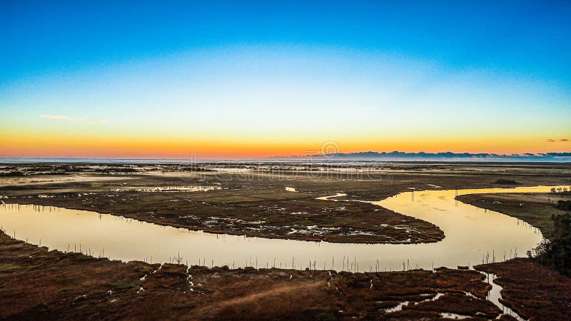 River through the marsh stock image. Image of sand, morning - 341184085