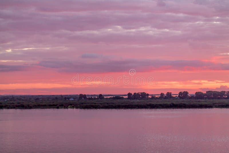 River and Meadows Landscape during Pink Summer Sunset Stock Photo ...