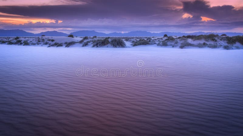 River with Mountains Covered with Snow in the Background during Pink ...