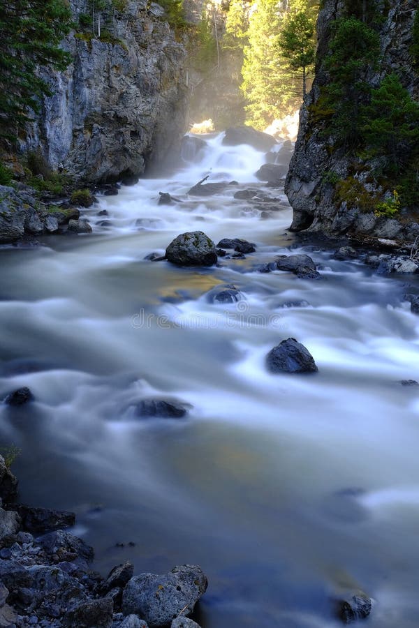 Cascading Waterfall Water Rolling Down Rocks To River Below Delicate ...