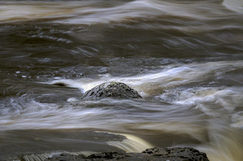 River with Muddy Water Flowing Over Rocks Stock Image - Image of fresh ...