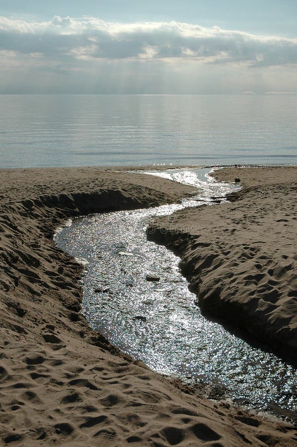 River outfall in sea stock image. Image of clouds, reflexion - 22061457