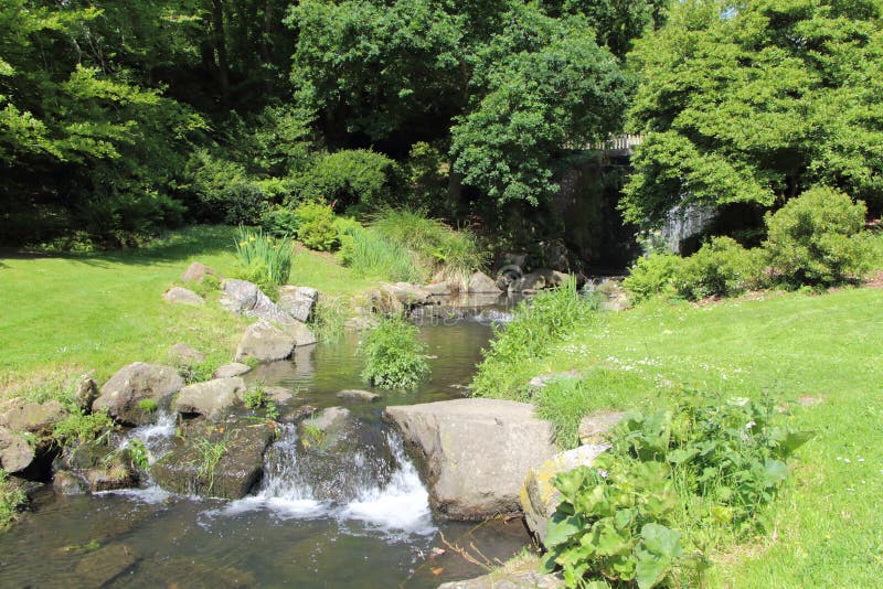 River in a park stock photo. Image of park, flow, stone - 99252598