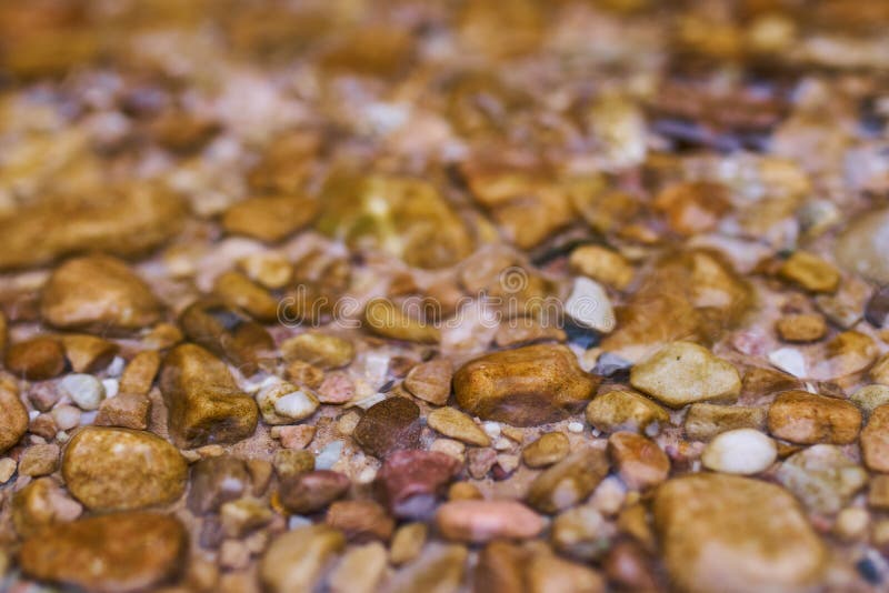 River pebbles in closeup stock photo. Image of abstract - 133152546