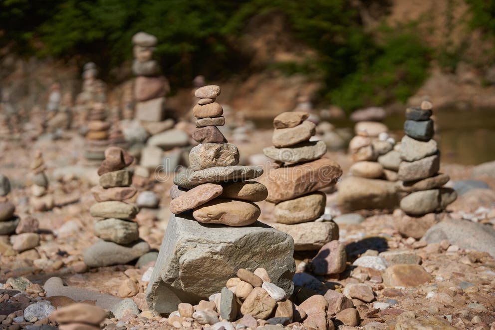 River Pebbles Stacked in Towers Stock Photo - Image of stability ...