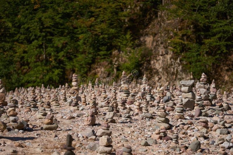 River Pebbles Stacked in Towers Stock Image - Image of pebble ...