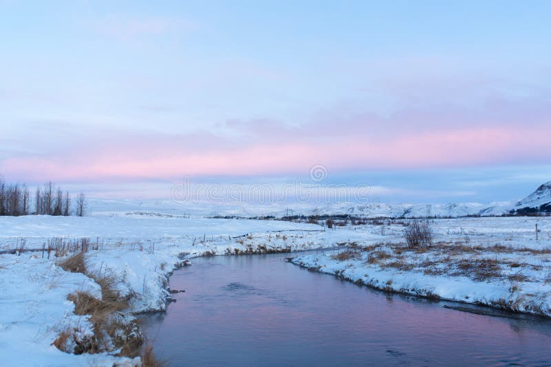 River on the Plain in Iceland. the Banks are Covered with Snow Stock ...