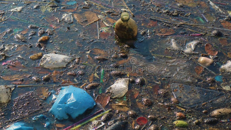 River that is Polluted with Various Garbage and Trash Stock Photo ...