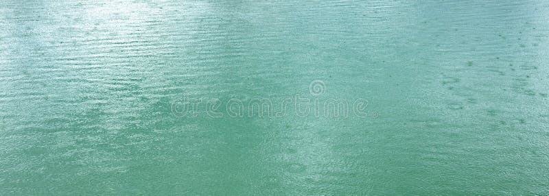 River in the Rain. Water Surface during a Downpour, Rainy Season Stock ...