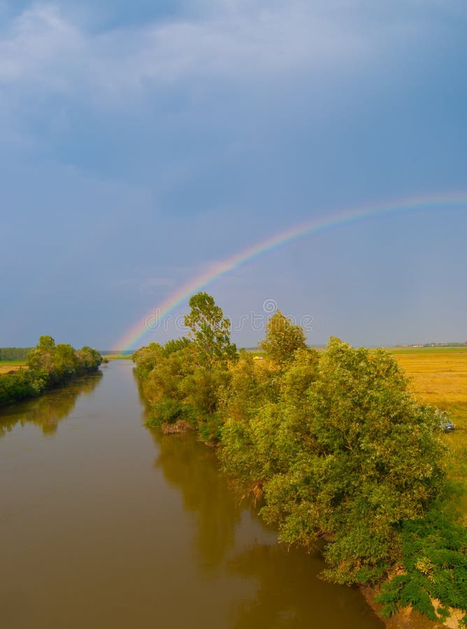 River and Rainbow stock photo. Image of rainbow, stormy - 21497596