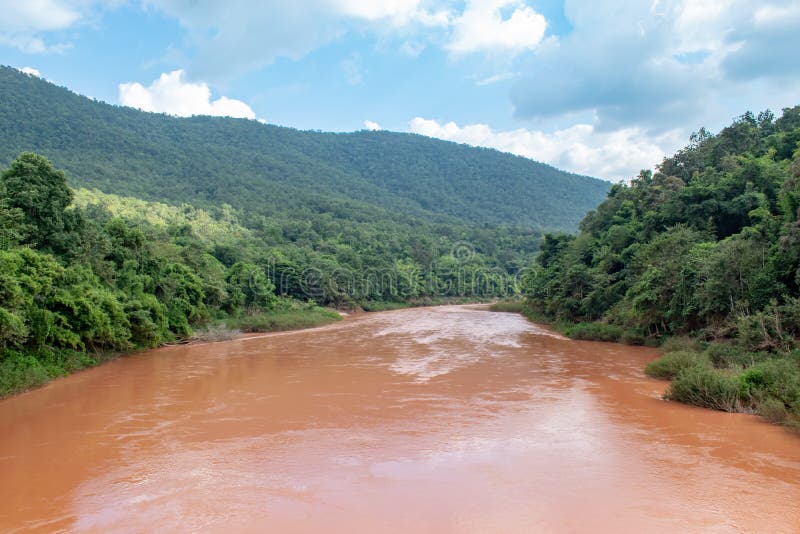 The River with Red from the Heavy Rain Flowing from the Mountains Stock ...